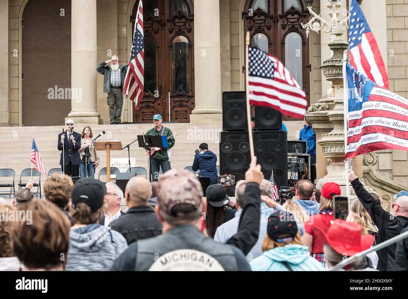 Lansing, Michigan, USA. 12th Oct, 2021. The attendees recite the pledge ...