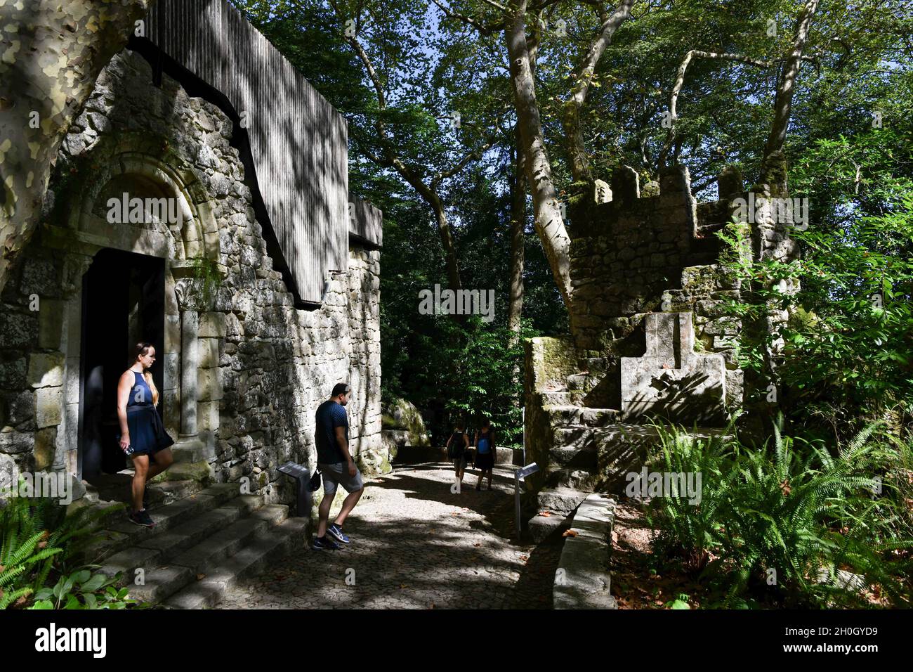 People walk through the different sections that correspond to the first ...