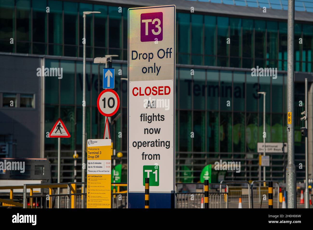 A closed sign is displayed outside terminal 3 at Manchester Airport ...