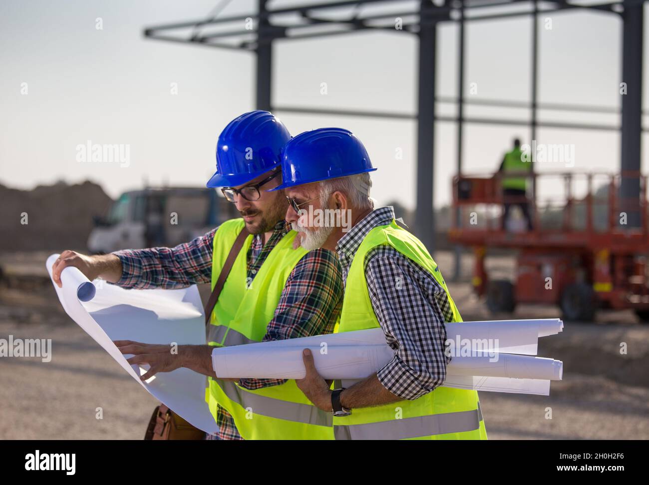Civil engineer blueprint talking hi-res stock photography and images ...