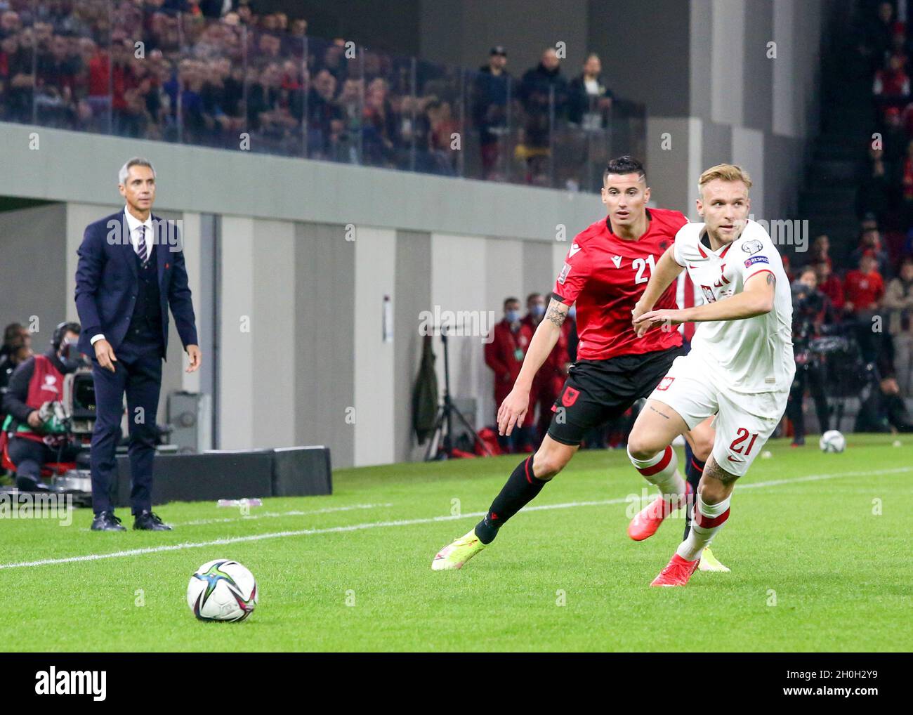 Puchacz (Poland) and Odise Roshi (Albania) during the 2022 FIFA World ...