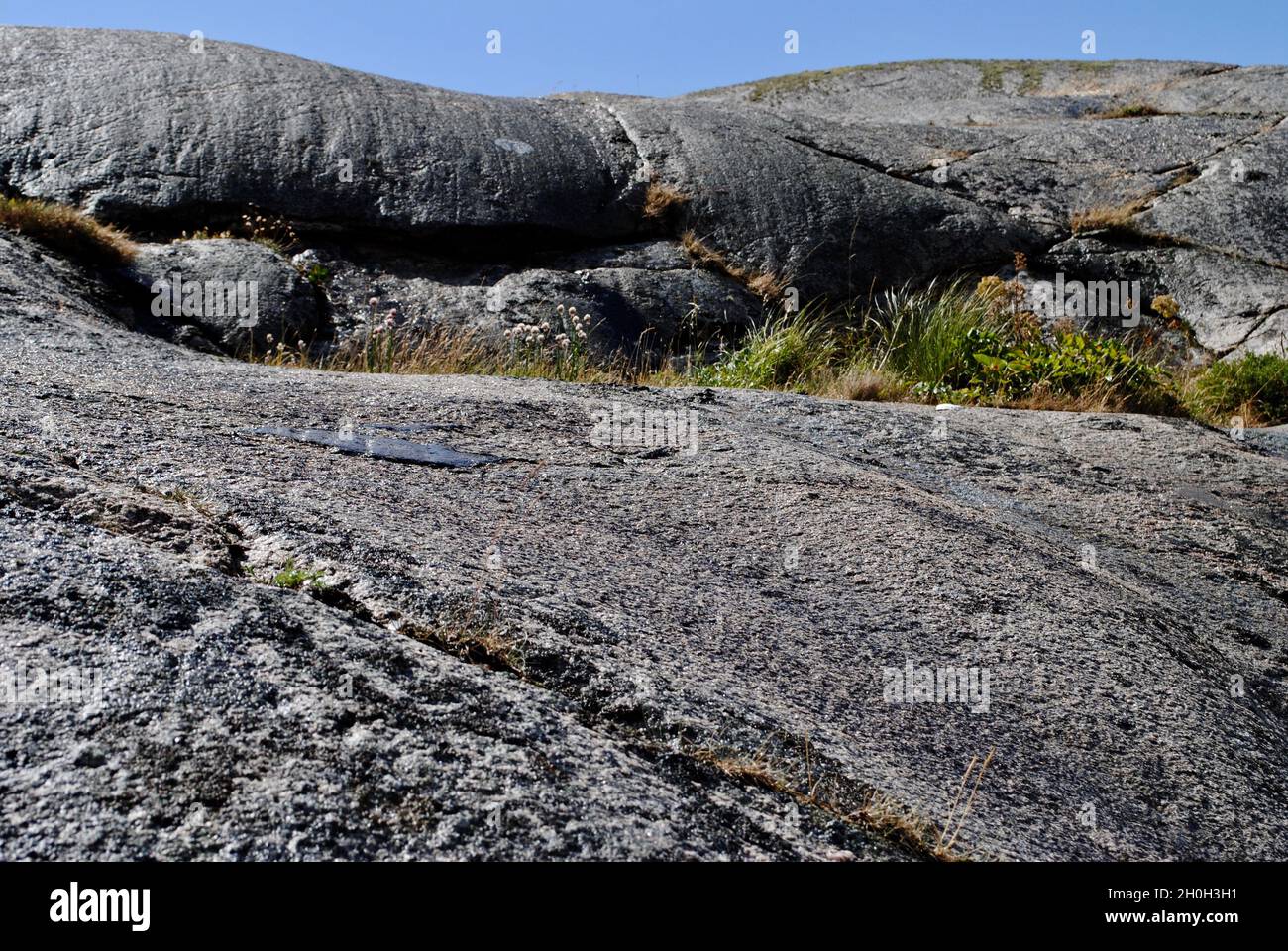 Glittering rocks and cliffs after rain on island in Fjällbacka ...