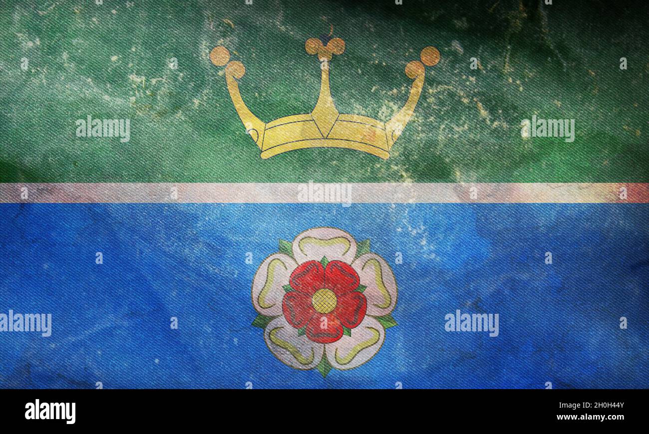 Top view of retro flag of Hampshire green and blue county with grunge ...