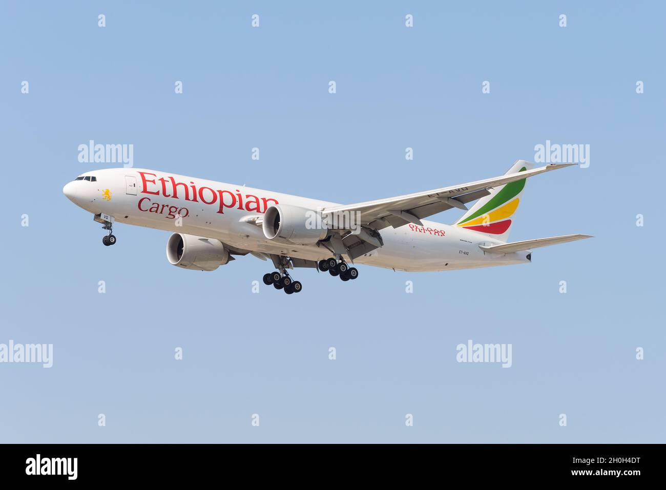 Ethiopian Cargo Boeing 777-200F aircraft flying. Freighter airplane of Ethiopian Cargo inbound ...