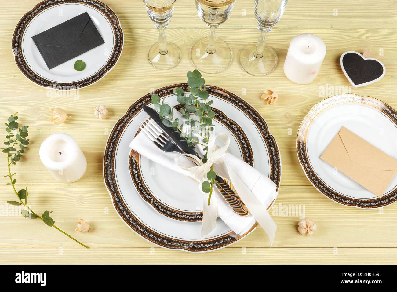 Table with plates and cutlery, view from above Stock Photo - Alamy