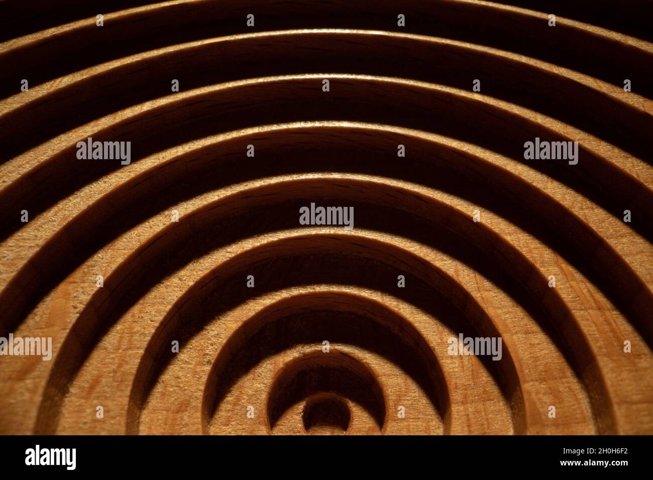 Aerial view of a circular geometric vertical beech wood plate ...