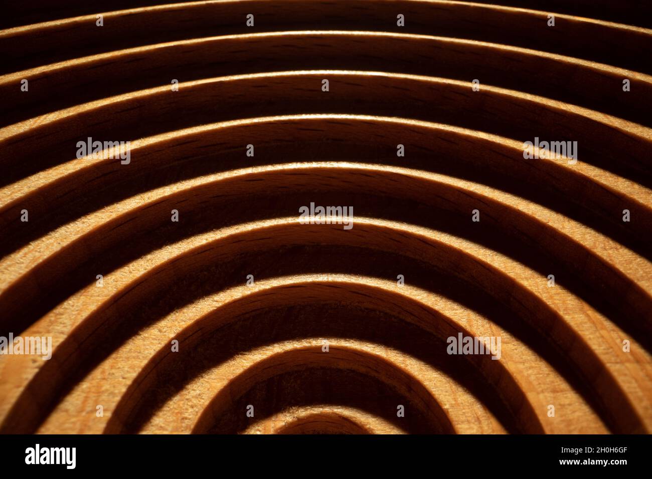 Aerial view of a circular geometric vertical beech wood plate ...