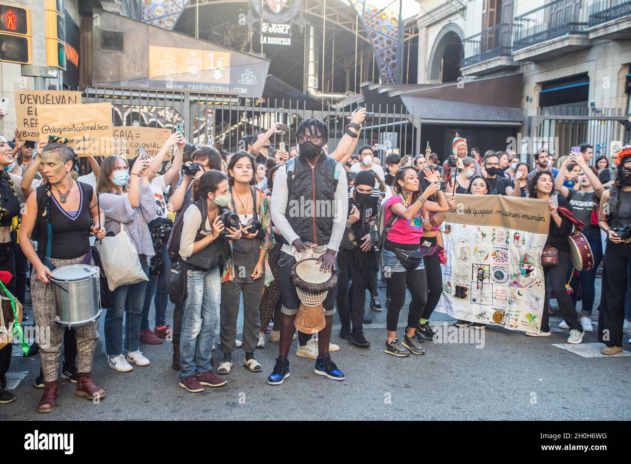 Protesters perform during the protest.Various anticolonialist groups ...