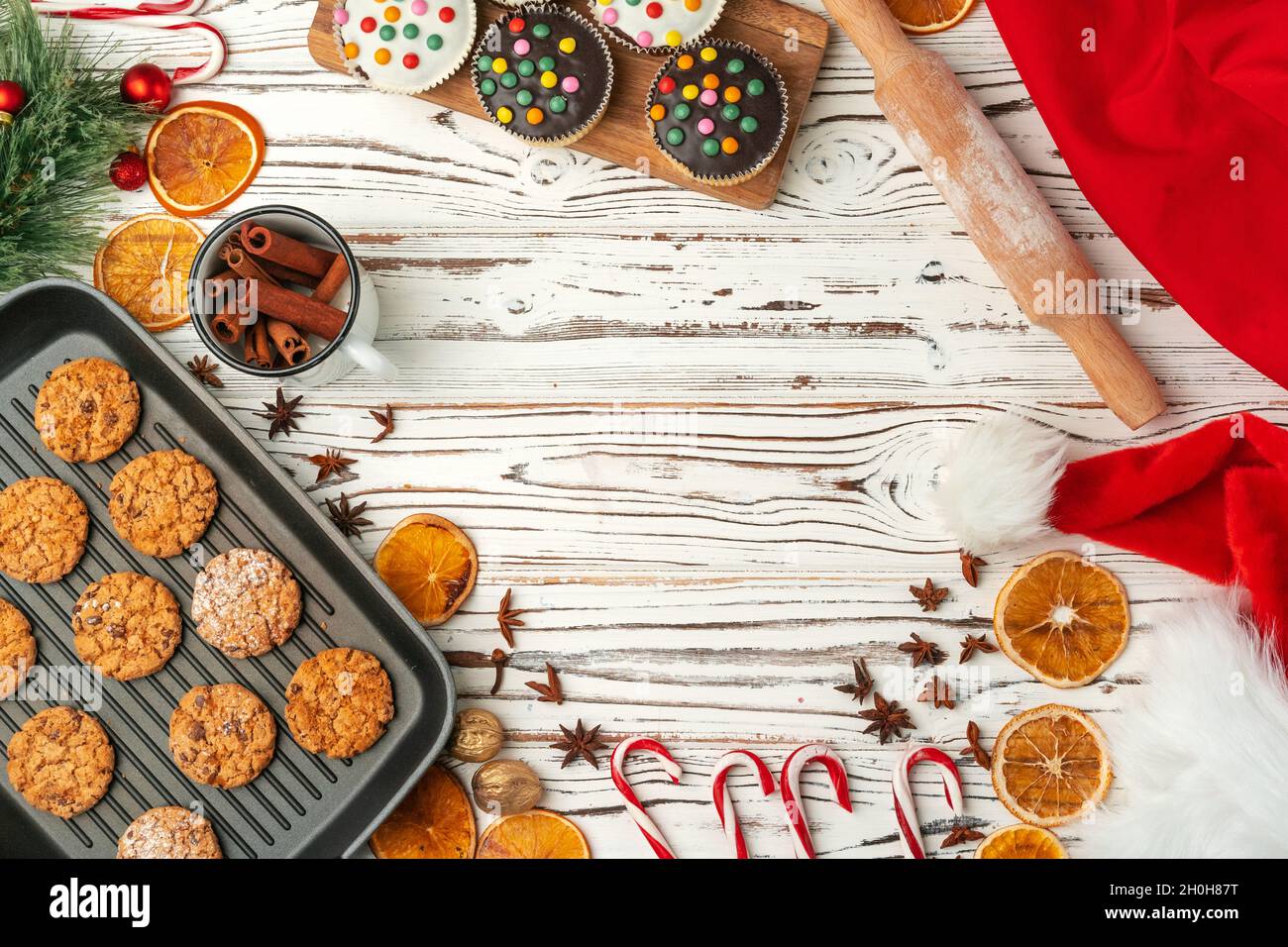 Top view of oat cookies in baking tray on wooden table Stock Photo - Alamy