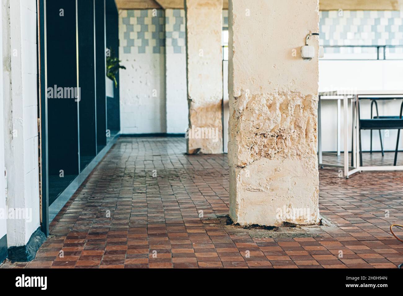 Old tiled wall used in a modern loft interior Stock Photo - Alamy