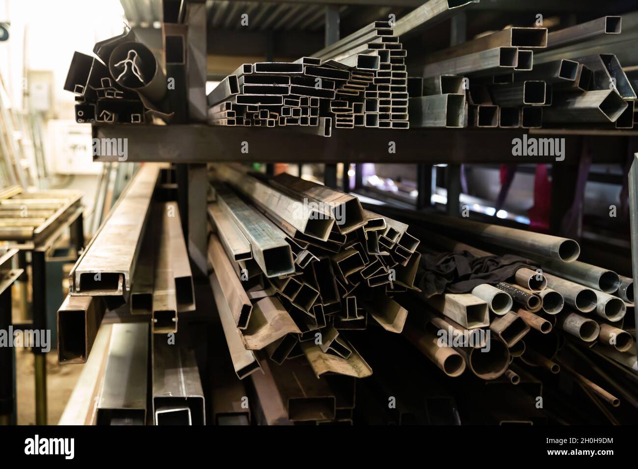 Stack of different metal pipes Stock Photo - Alamy