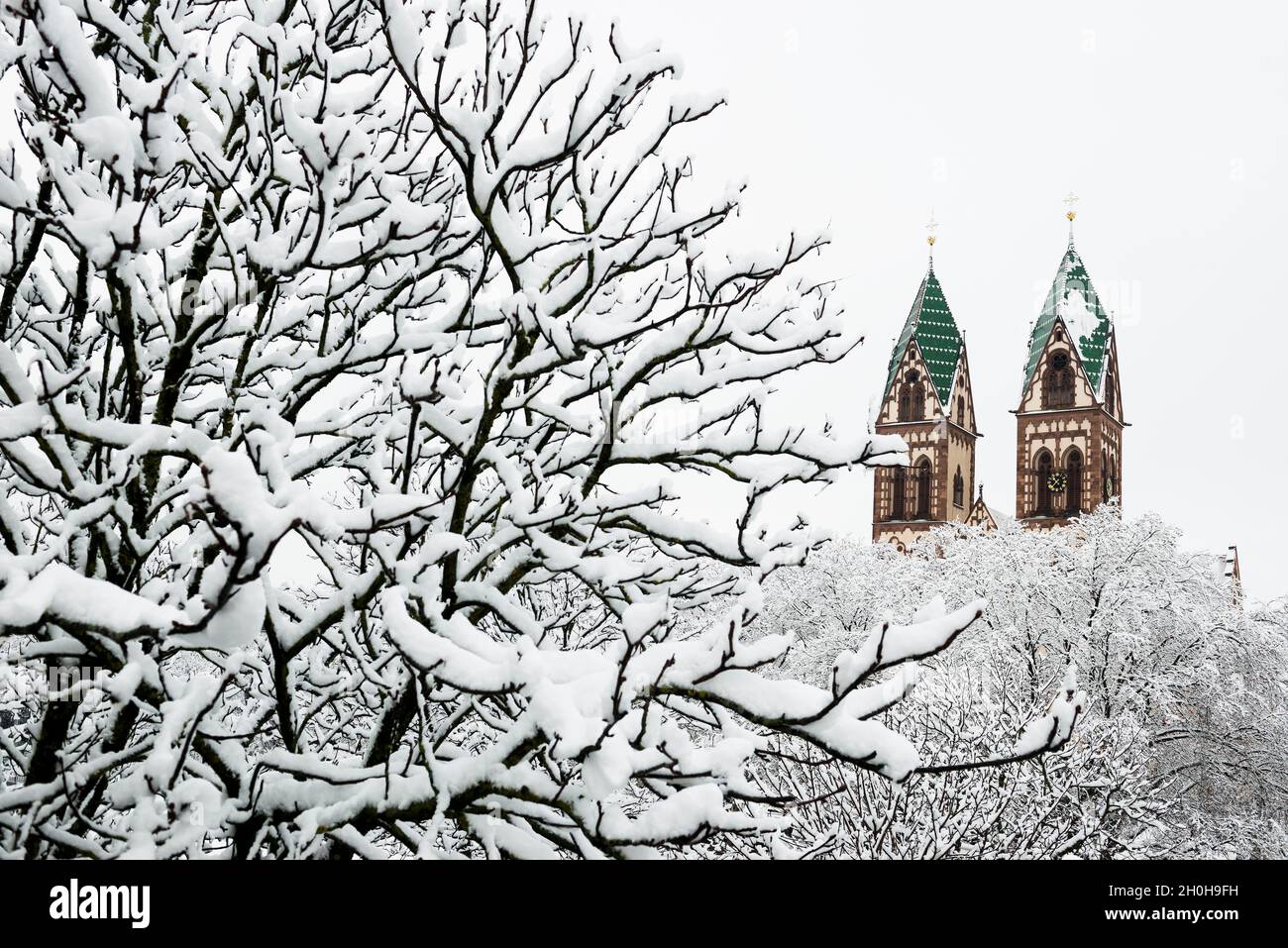 Winter atmosphere with snow, Stuehlinger Church, Freiburg im Breisgau ...