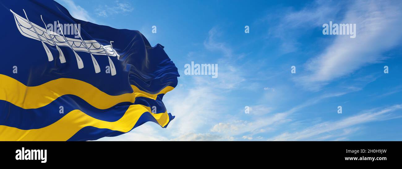 flag of St Annes on Sea town at cloudy sky background on sunset ...