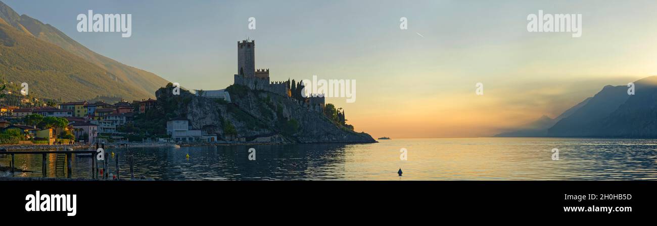 Historic coastal town of Malcesine with the castle Castello Scaligero ...