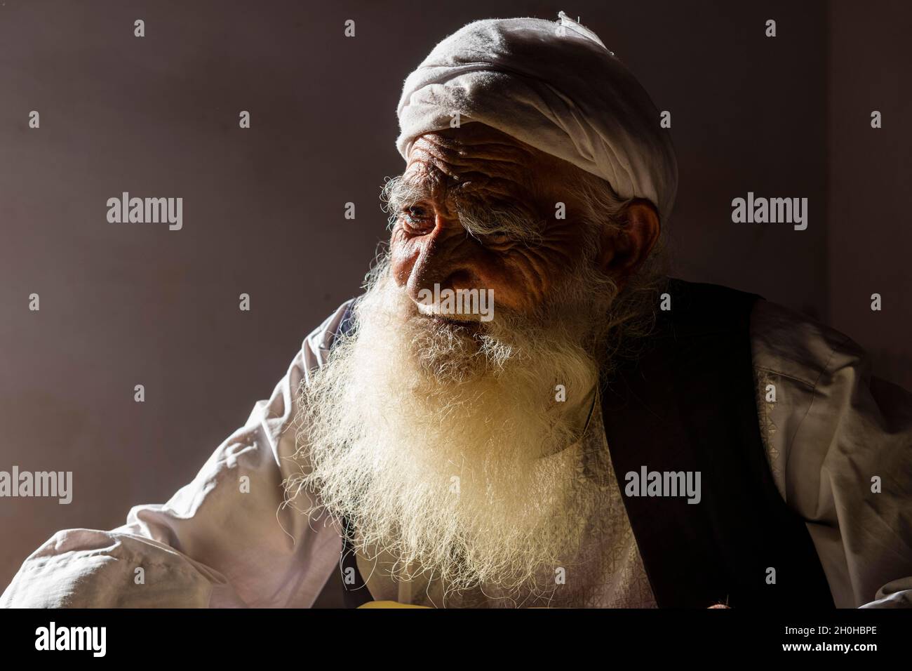 Sufi priest studying the holy Quran in the Shrine of Mawlana Abdur ...