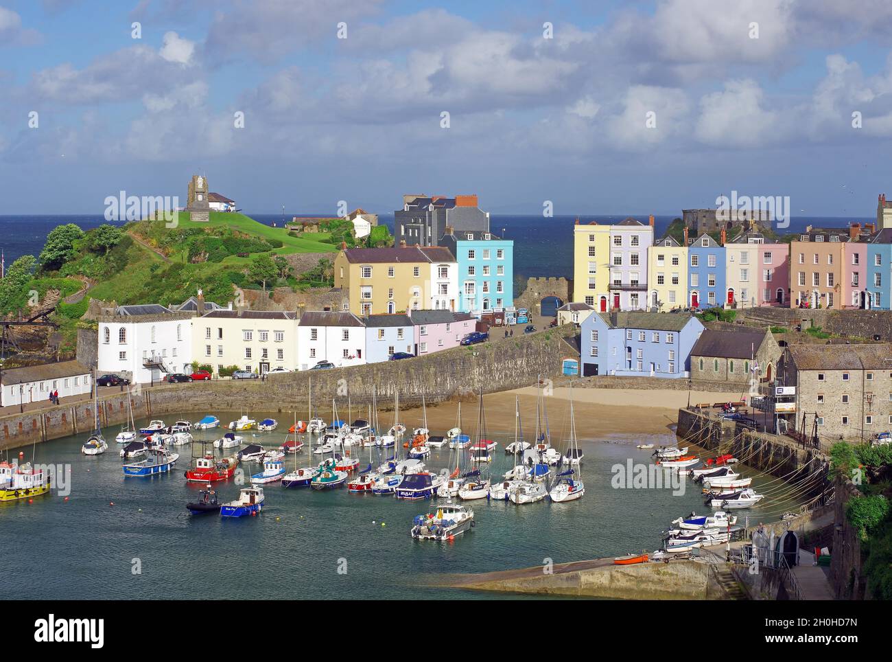 Boats and colourful houses, small harbour and sea, TEnby, Pembrokeshire ...