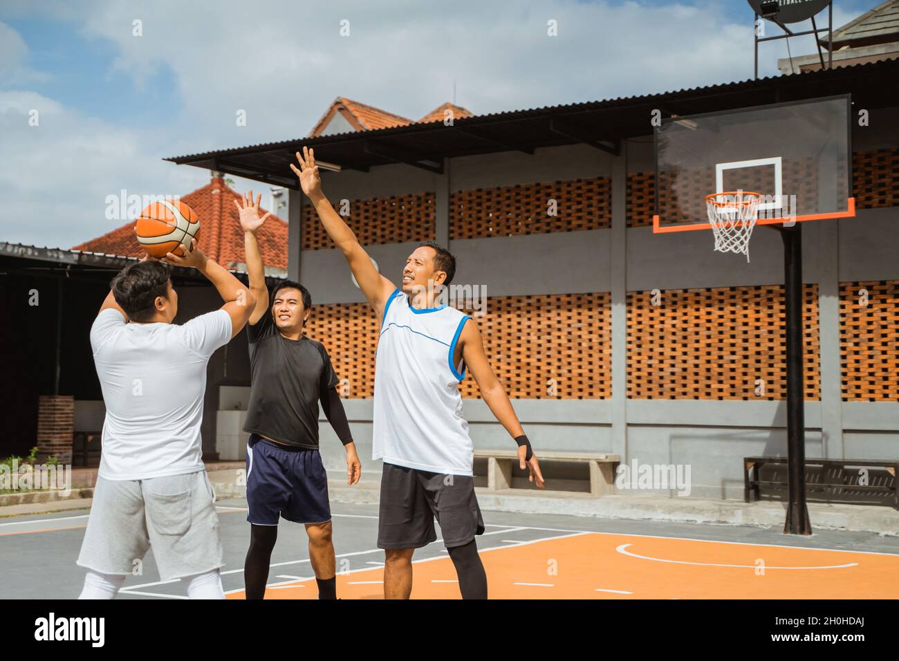 Three point shooting hi-res stock photography and images - Alamy