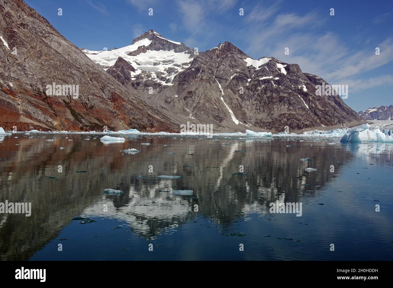 Fjord with drift ice, glacier and wild mountain landscape, Knud ...