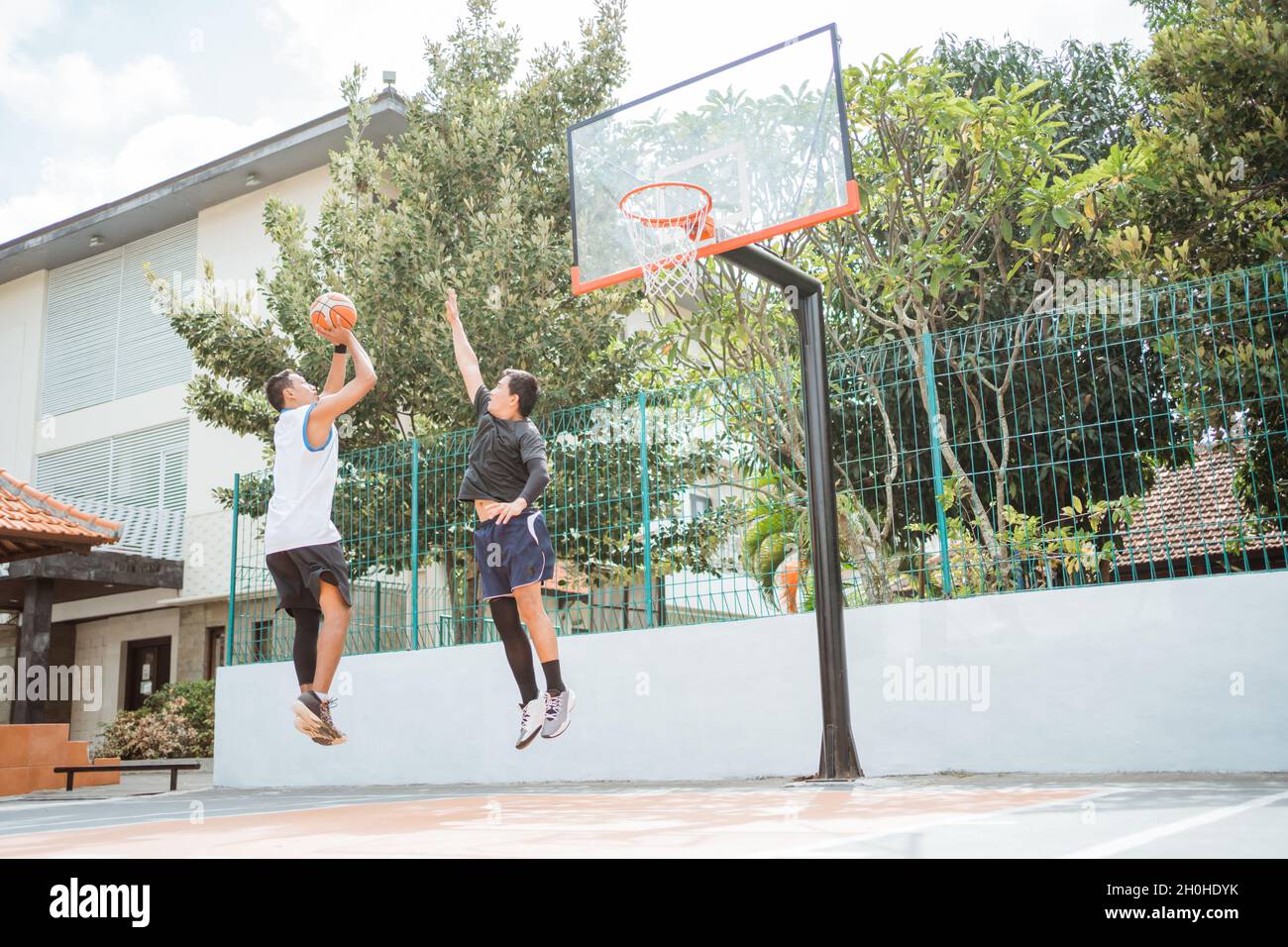 Shot young asian basketball hi-res stock photography and images - Alamy