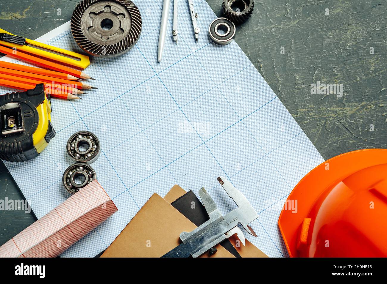 Car engineering tools top view on graph paper Stock Photo - Alamy