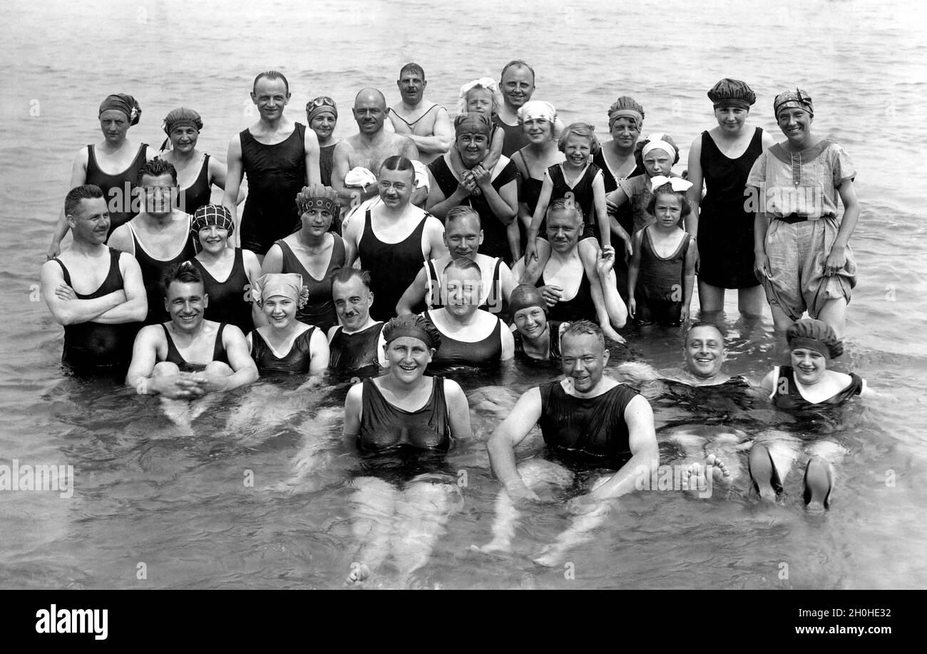 Bathing group on the beach, funny, laughing, summer holidays, holiday ...