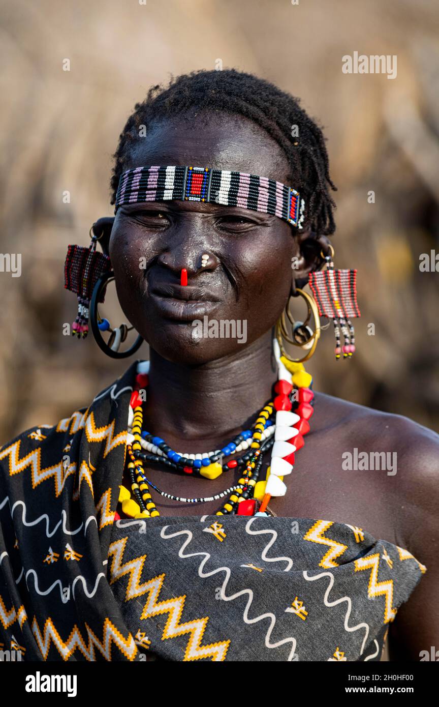 Traditional dressed woman, Jiye tribe, Eastern Equatoria State, South ...