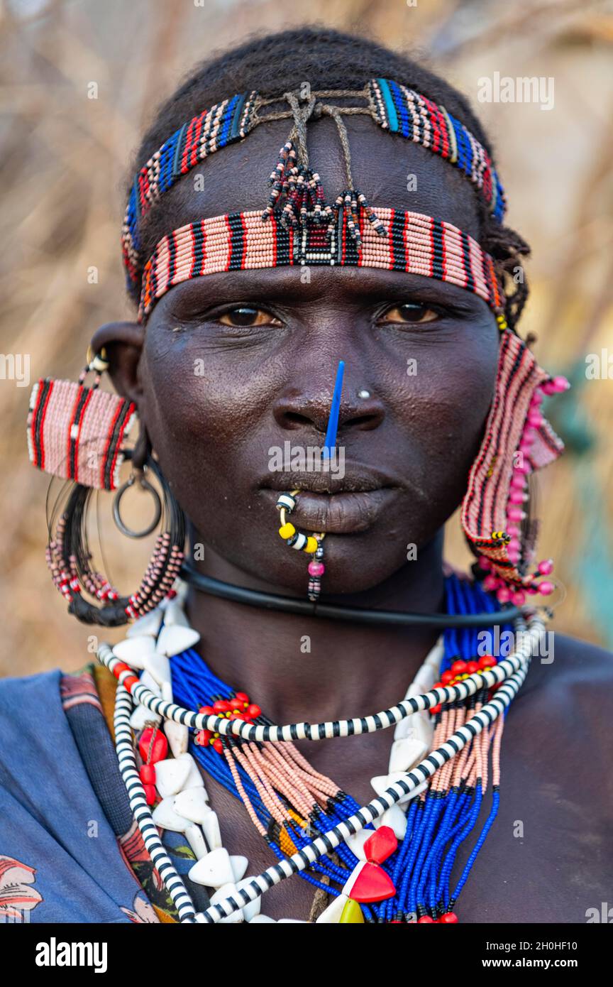 Traditional dressed woman, Jiye tribe, Eastern Equatoria State, South ...