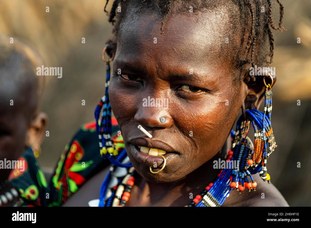 Traditional dressed woman, Jiye tribe, Eastern Equatoria State, South ...
