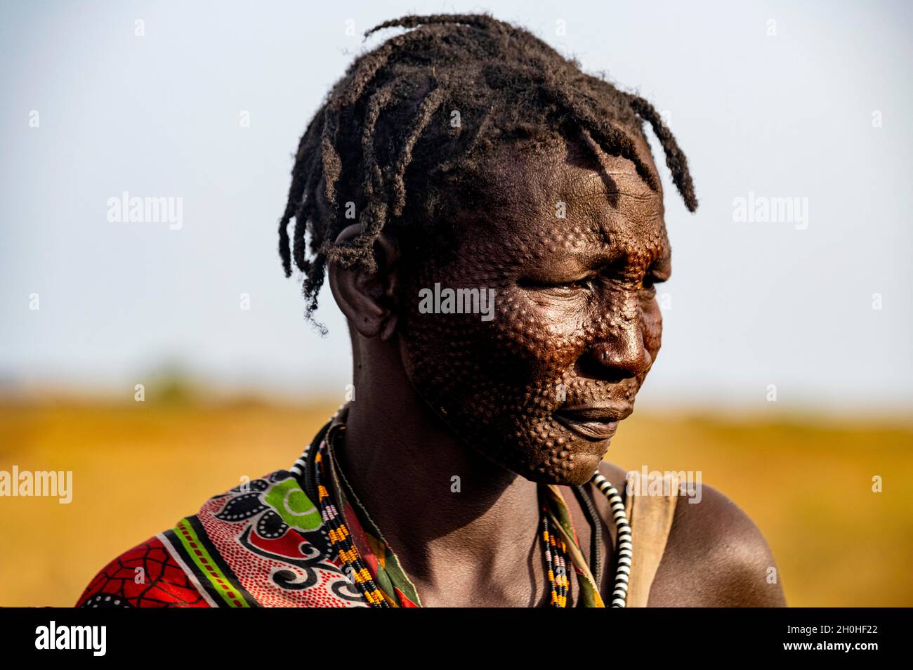 Scar face as a mark of beauty man from the Jiye tribe, Eastern ...