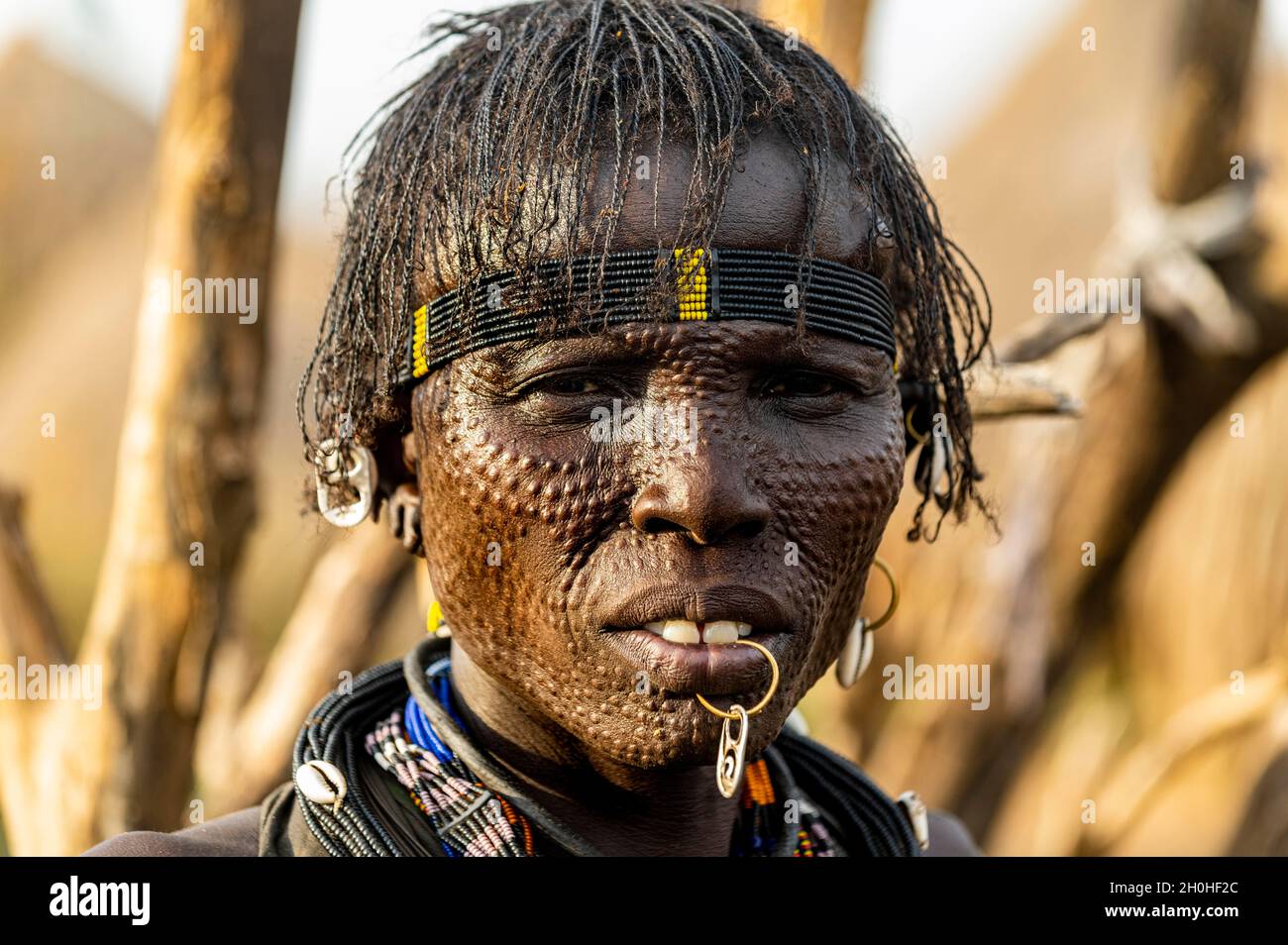 Scar face as a mark of beauty woman from the Jiye tribe, Eastern ...