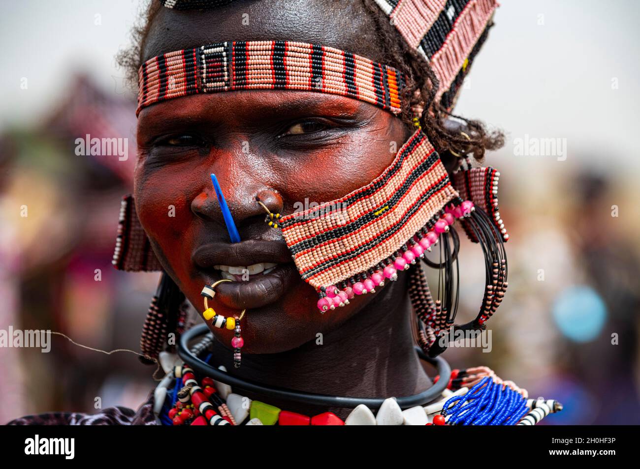 Traditional dressed woman of the Jiye tribe, Eastern Equatoria State ...