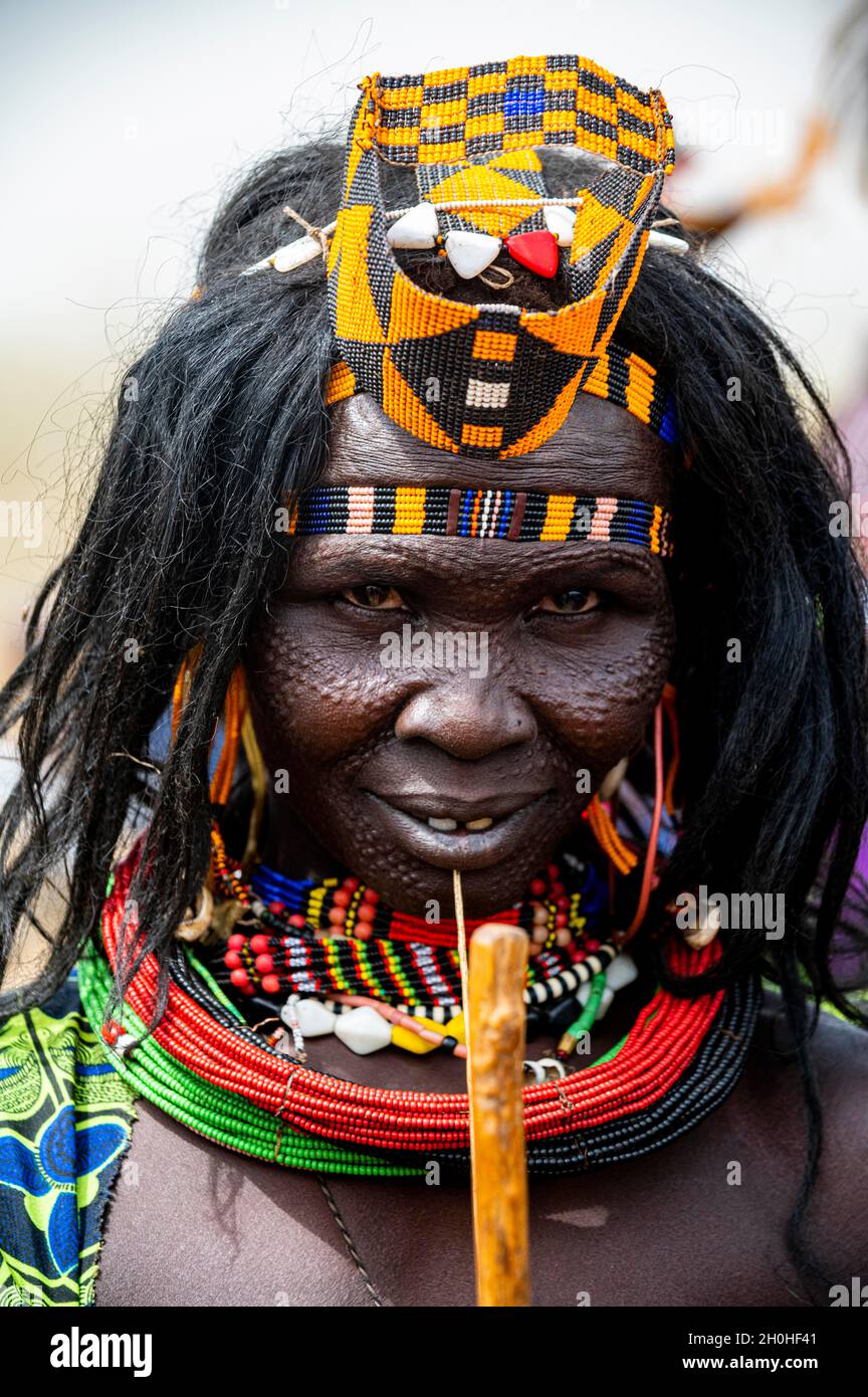 Traditional dressed woman of the Jiye tribe, Eastern Equatoria State ...