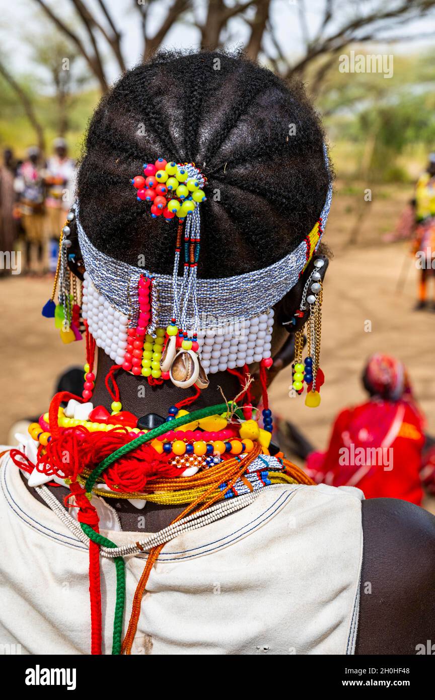 Traditional head dress, of a young girl. Laarim tribe, Boya hills ...