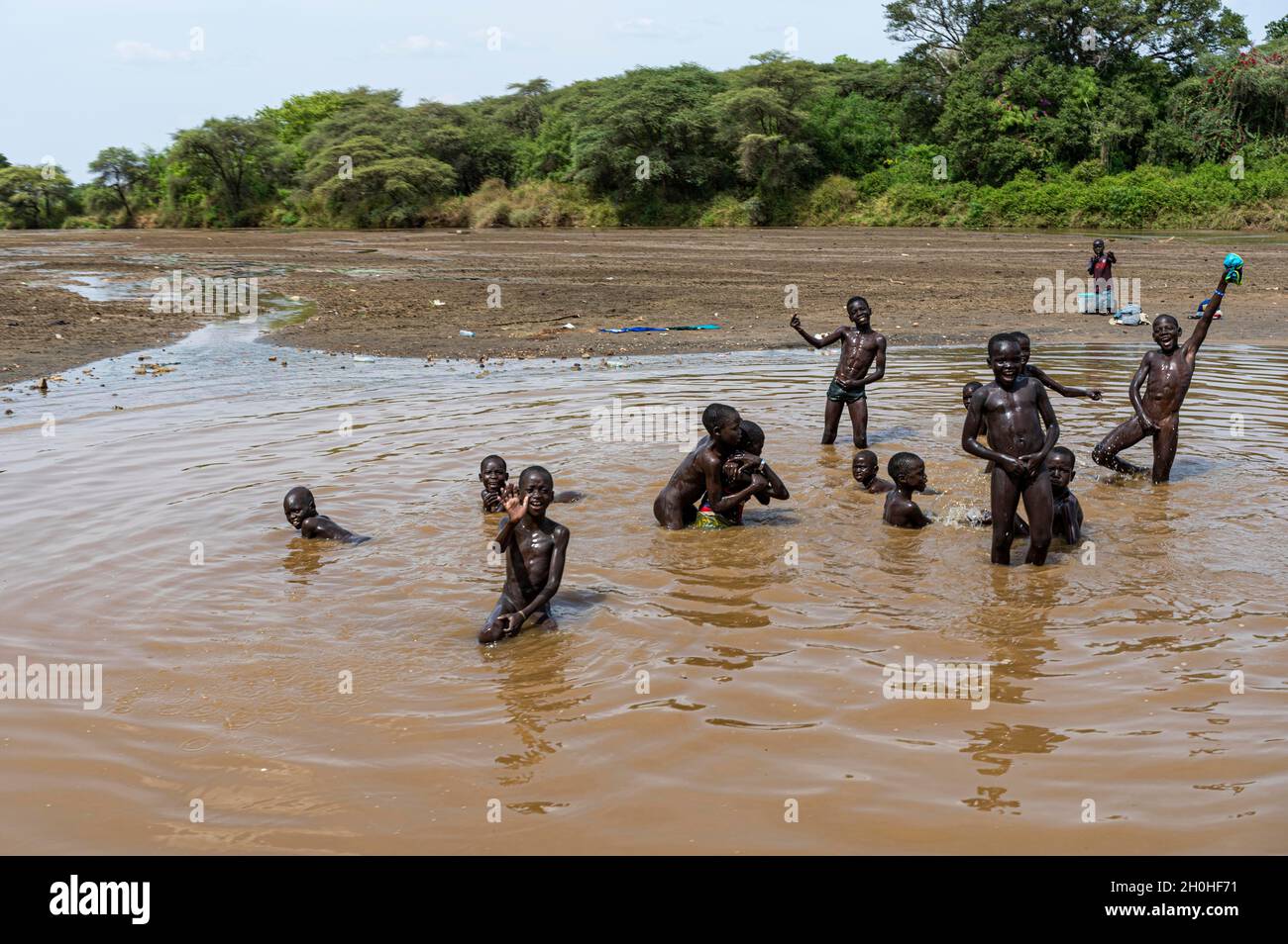Children playing by river hi-res stock photography and images - Alamy