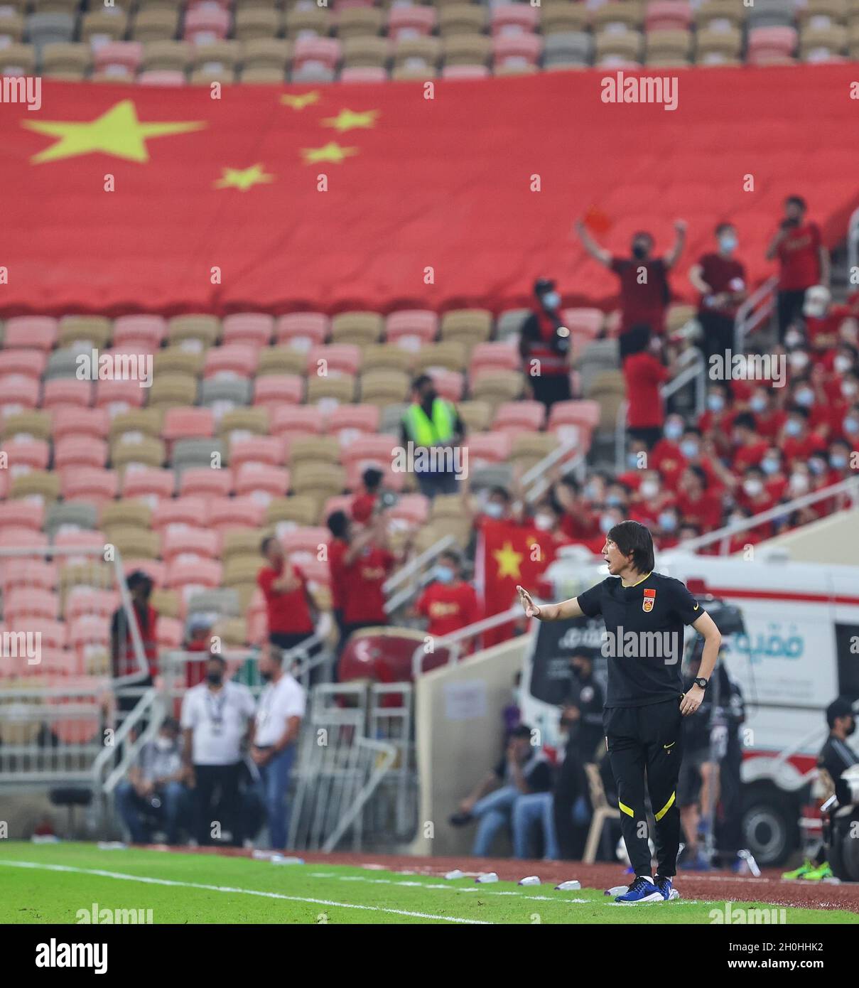 Jeddah, Saudi Arabia. 12th Oct, 2021. Li Tie, head coach (front) of ...
