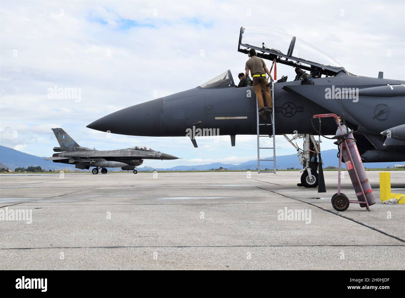 U.S. Airmen from the 336th Fighter Squadron, 4th Fighter Wing, Seymour ...