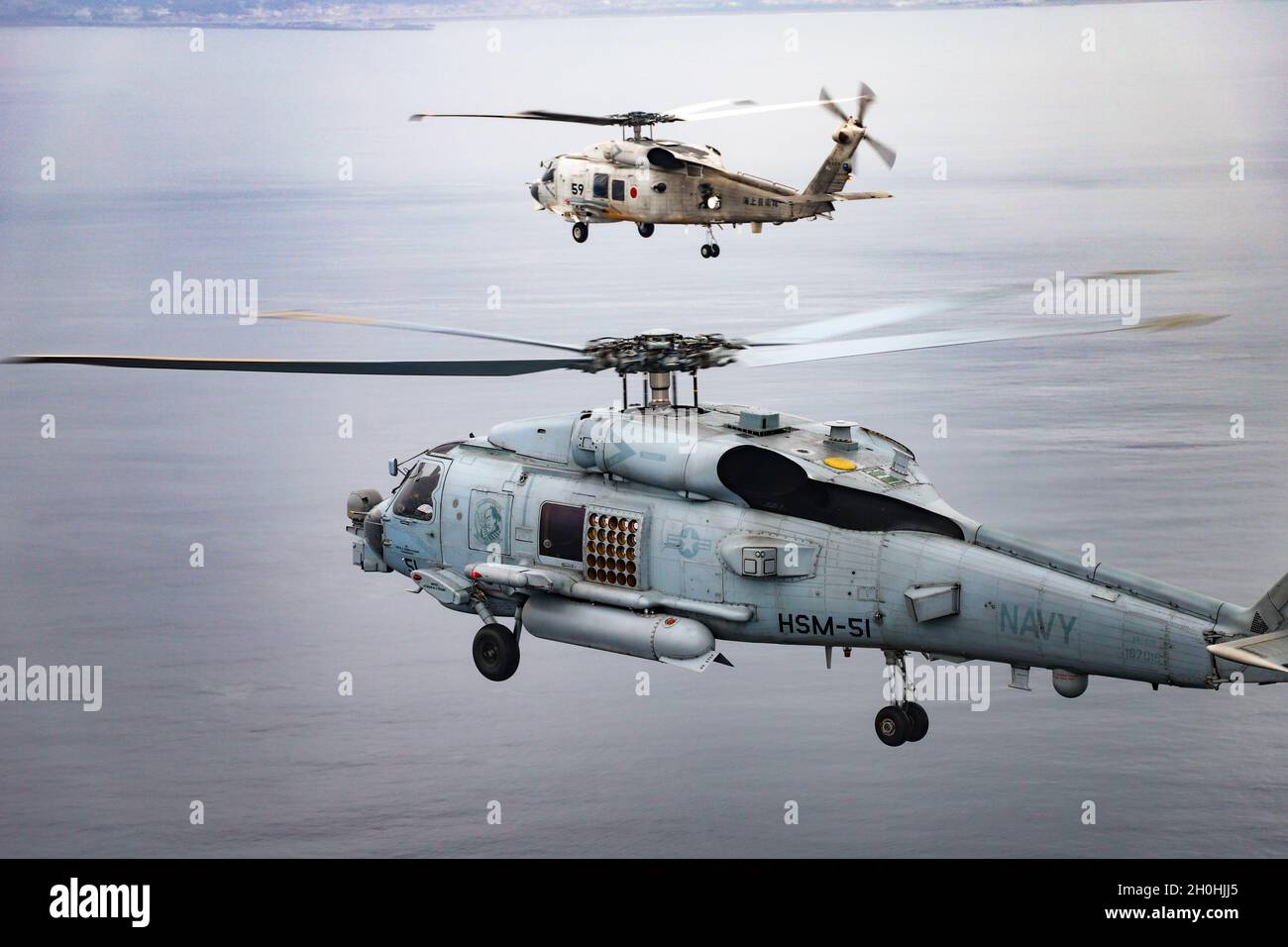 PHILIPPINE SEA (Sept. 14, 2021) – An MH-60R assigned to the “Warlords ...