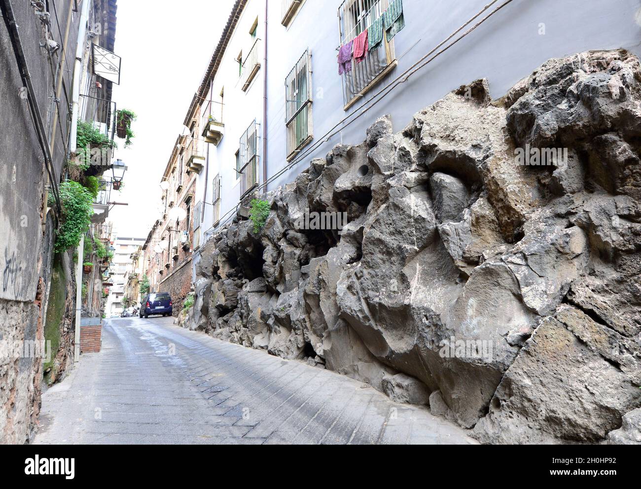 Old buildings built on large rocks in Catania, Italy Stock Photo - Alamy