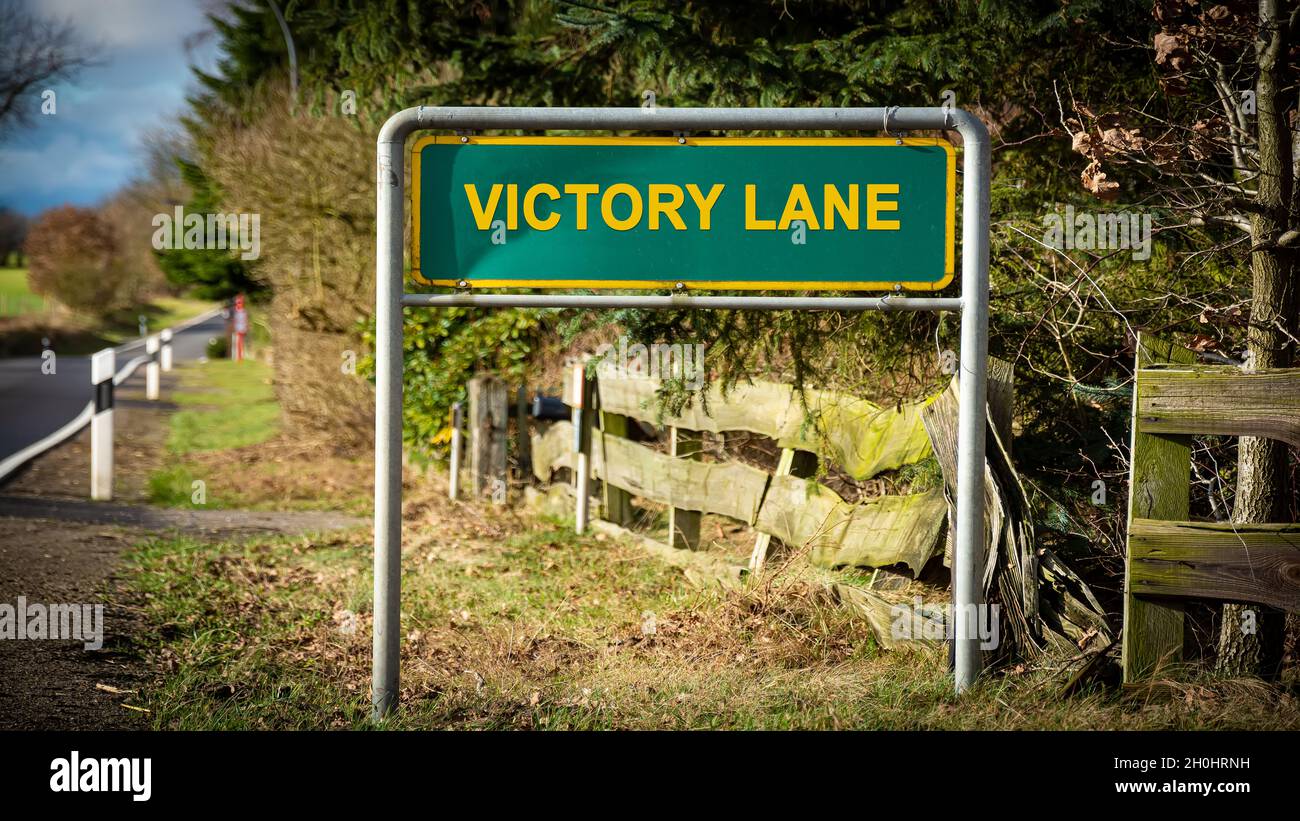 Street Sign the Direction Way to Victory Lane Stock Photo - Alamy