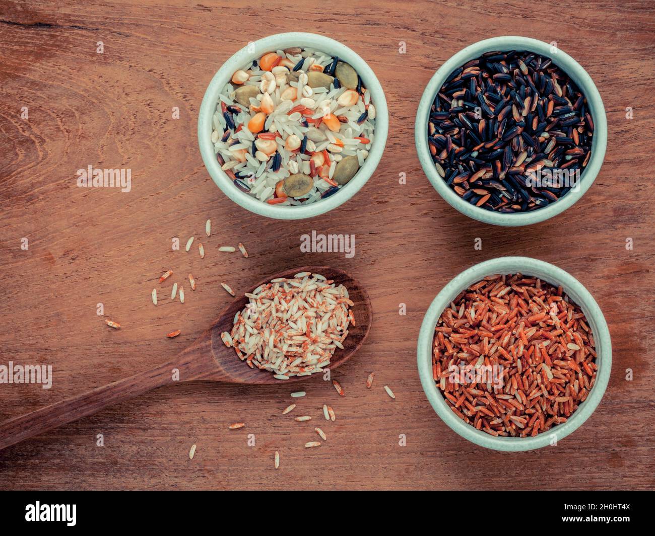 Mixed Whole grain Traditional Thai rice in the spoon and bowl best rice ...