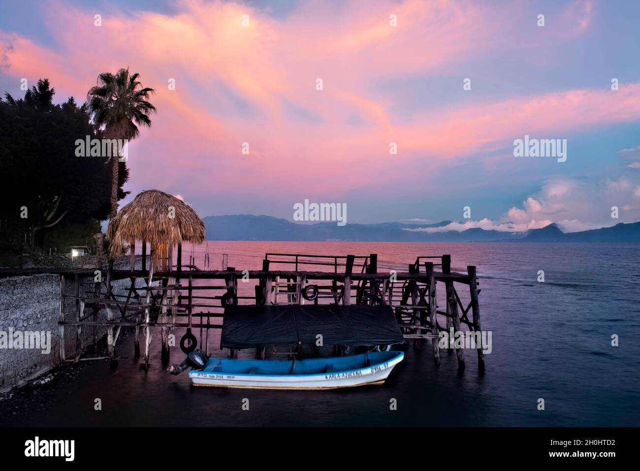 Sunset on the pier, Lake Atitlan, San Marcos, Guatemala Stock Photo - Alamy