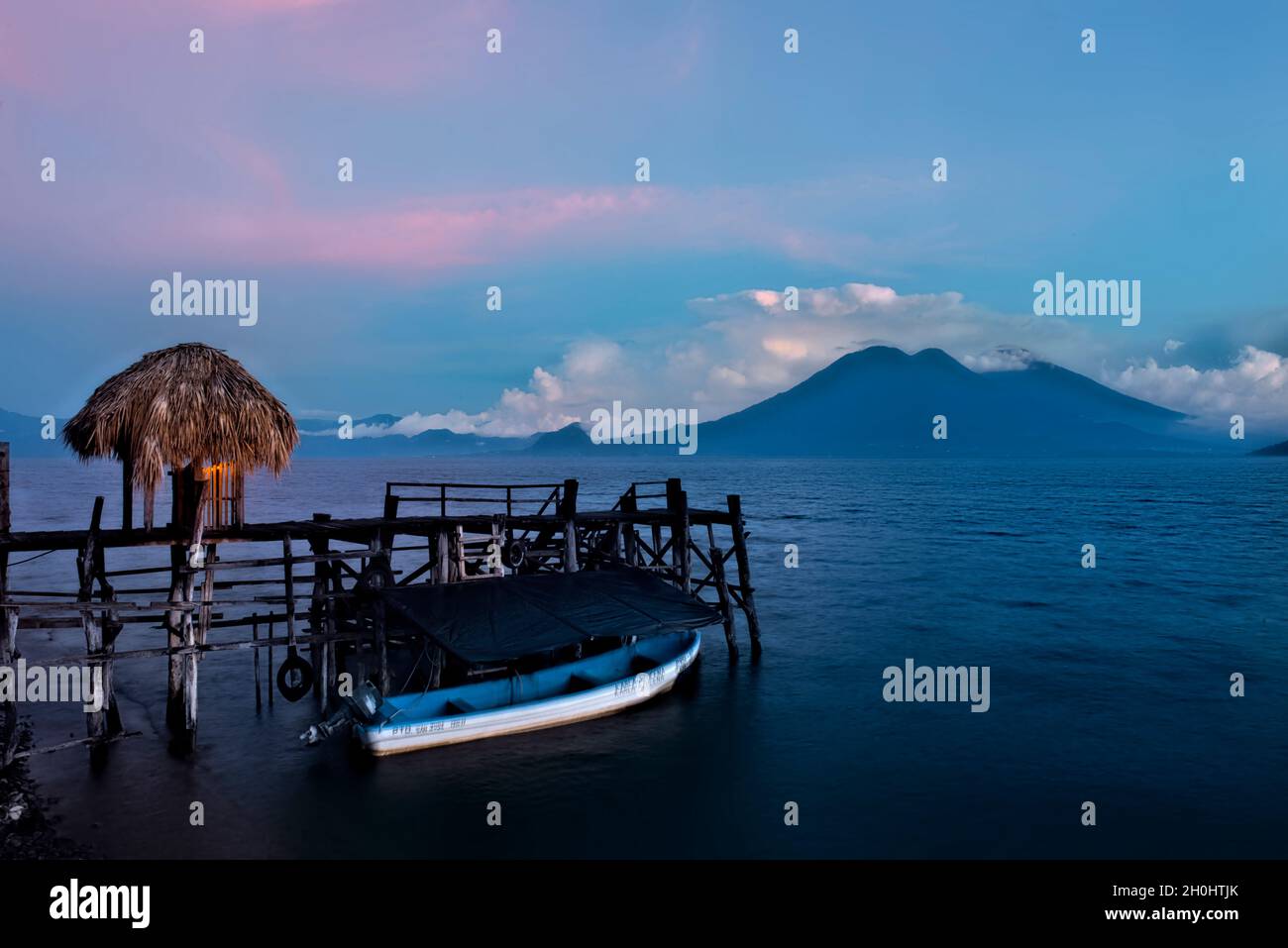 Sunset on the pier, Lake Atitlan, San Marcos, Guatemala Stock Photo - Alamy