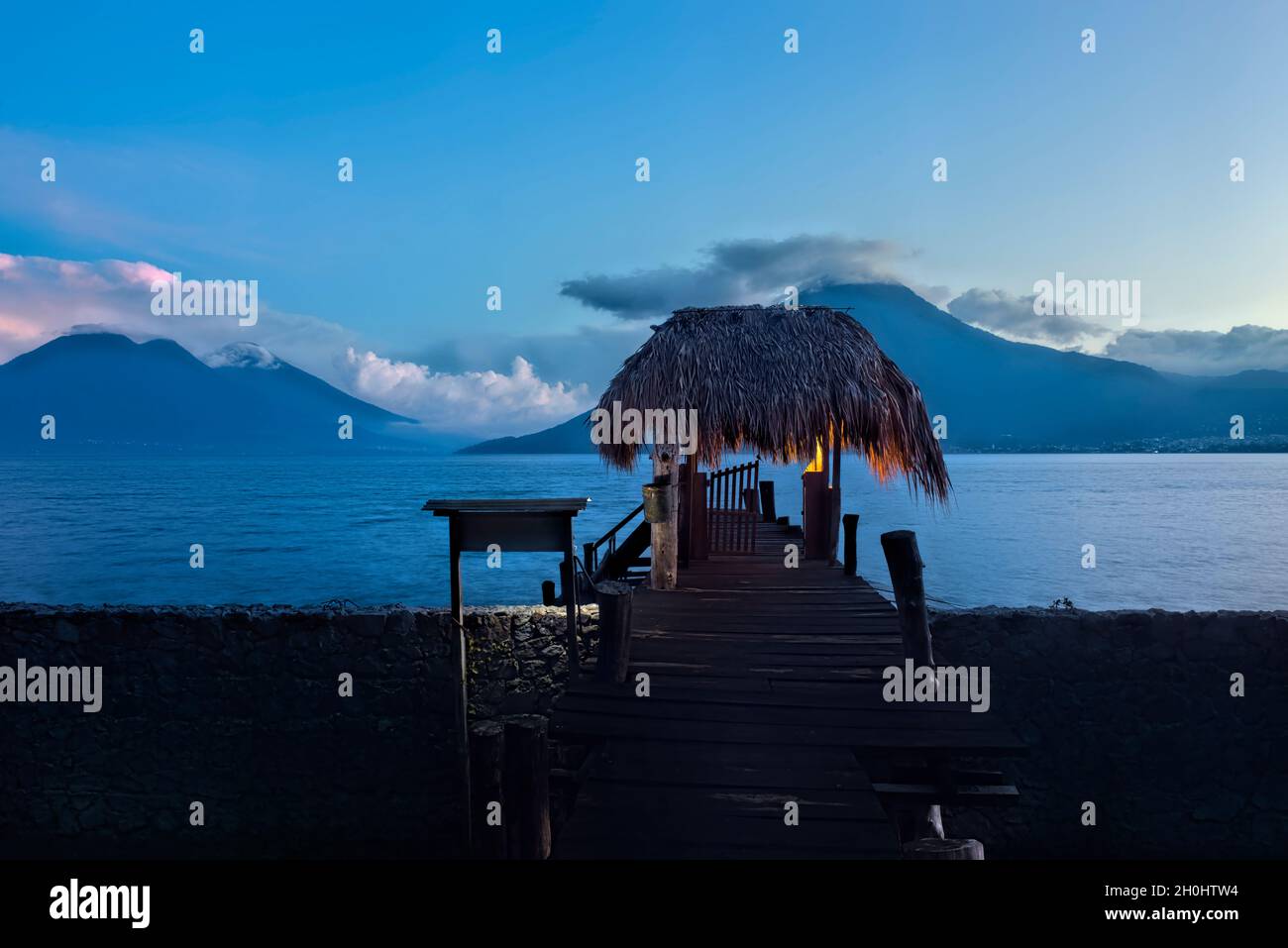 Sunset on the pier, Lake Atitlan, San Marcos, Guatemala Stock Photo - Alamy