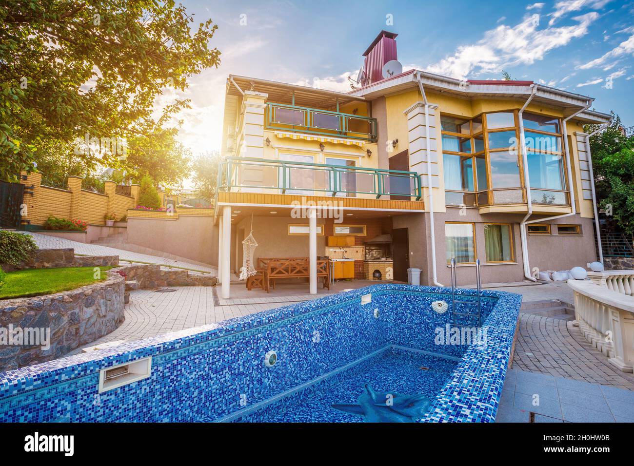 large country house with a swimming pool Stock Photo - Alamy