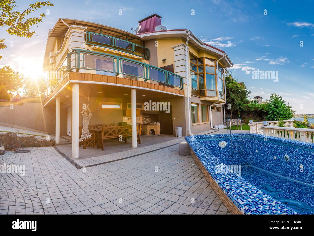 large country house with a swimming pool Stock Photo - Alamy