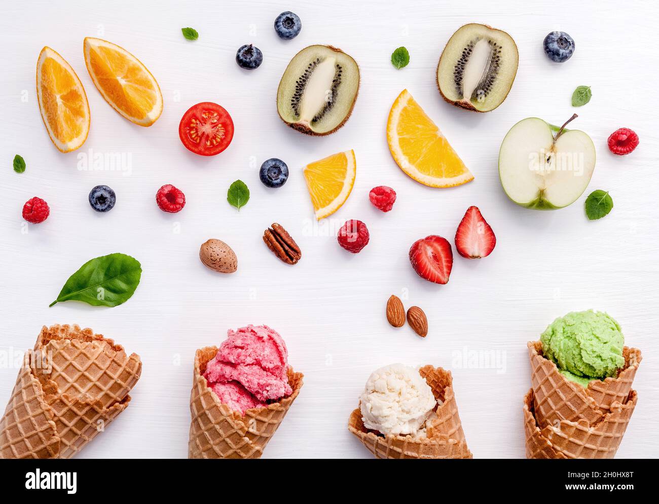 Cones and colorful various fruits raspberry ,blueberry ,strawberry ...