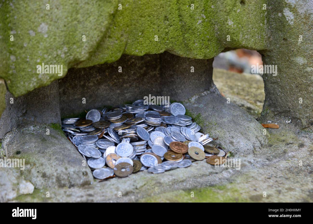 Coins offered in the temple in Karuizawa, Japan Stock Photo - Alamy