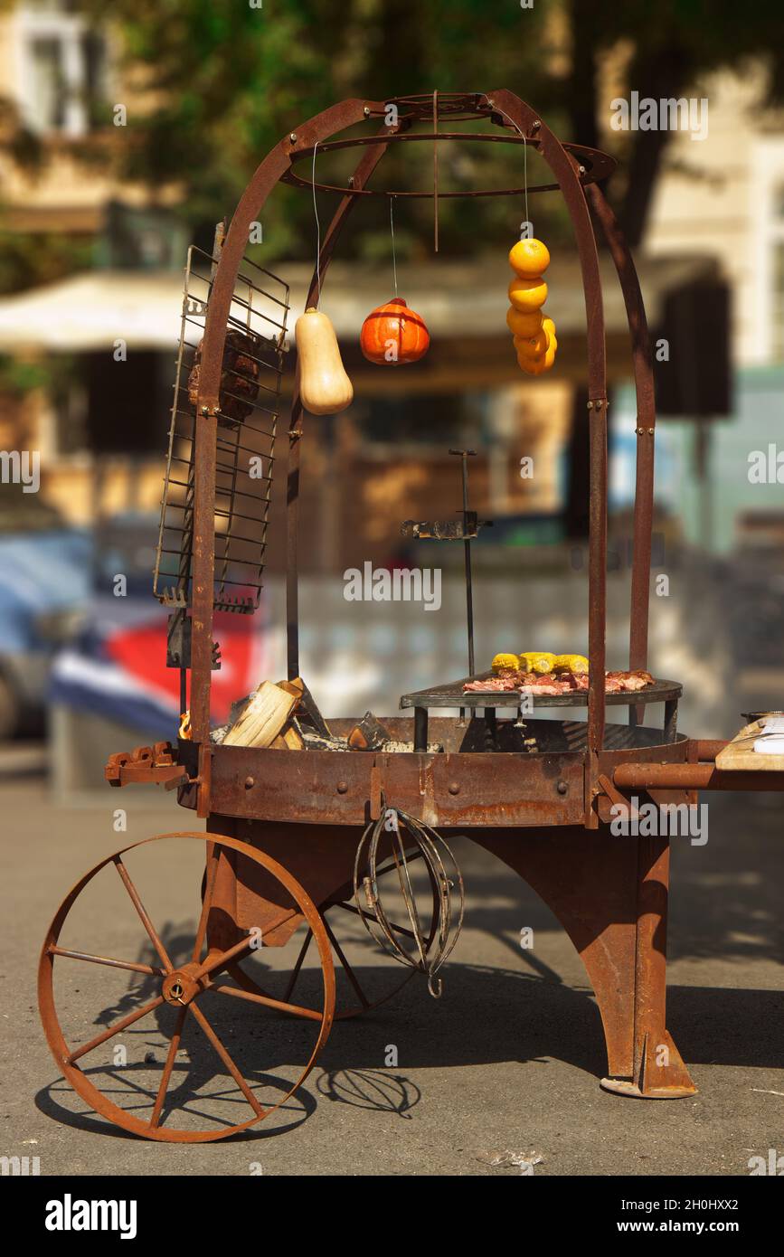 Barbecue stand with blurred background. Large mobile grill at Farmers ...