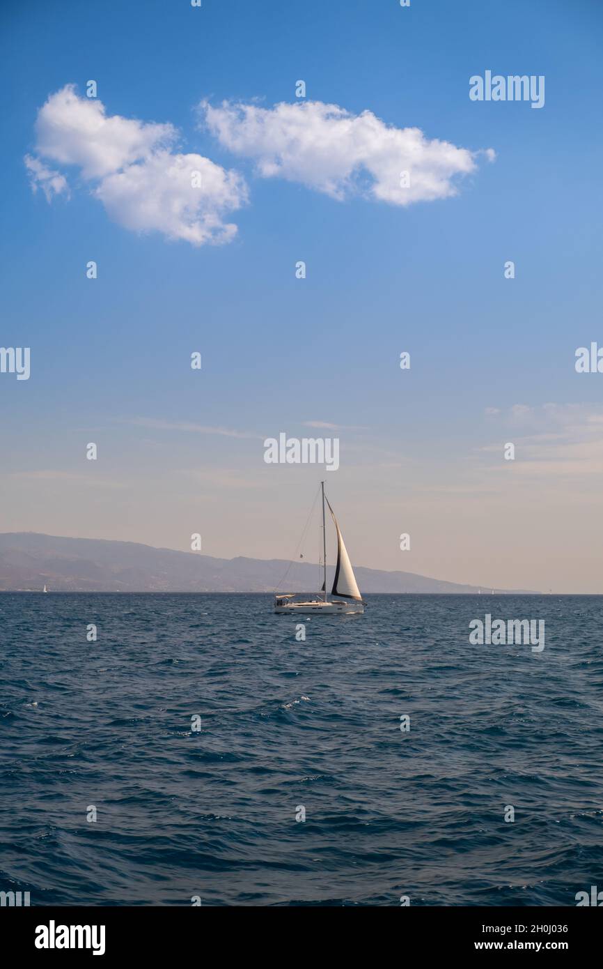 Catamaran sail Yacht cruising on deep blue sea water Stock Photo - Alamy