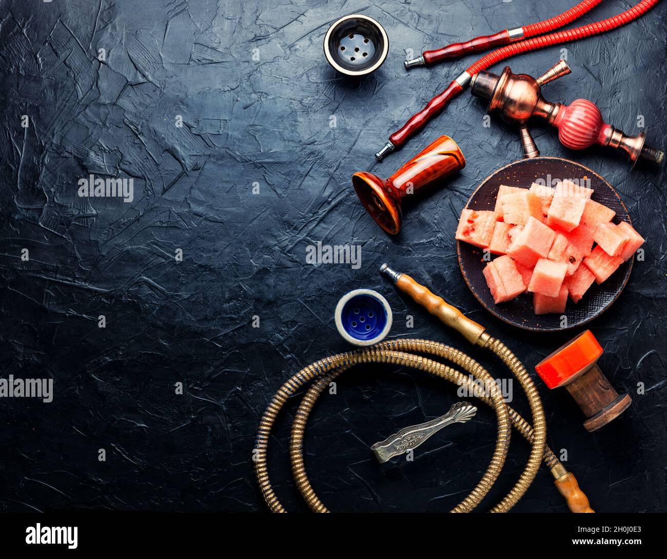 Tasty smoking hookah with watermelon flavored tobacco.Space for text ...